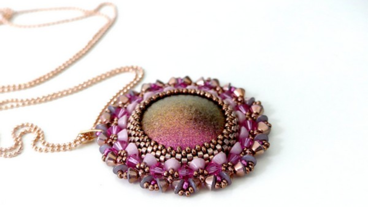 K'amille pendant with cabochon, Konos glass beads by Puca and Pure ...